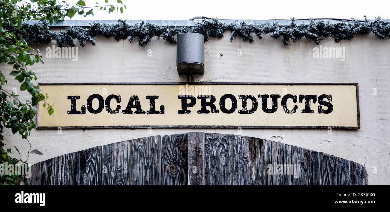 Local Products. Advertising banner on the wall of the building Stock ...