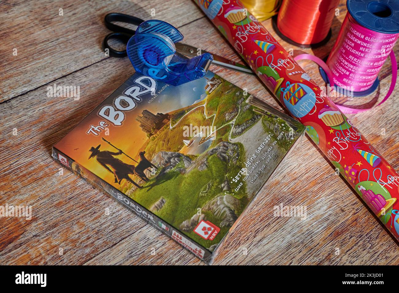 Berlin, Germany - September 25, 2022: Board game with wrapping paper ...