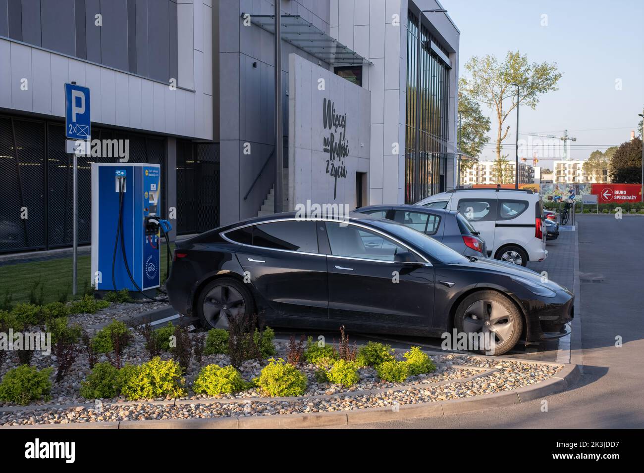 Warsaw, Poland - August 25, 2022: A static shot of a solid black Tesla ...