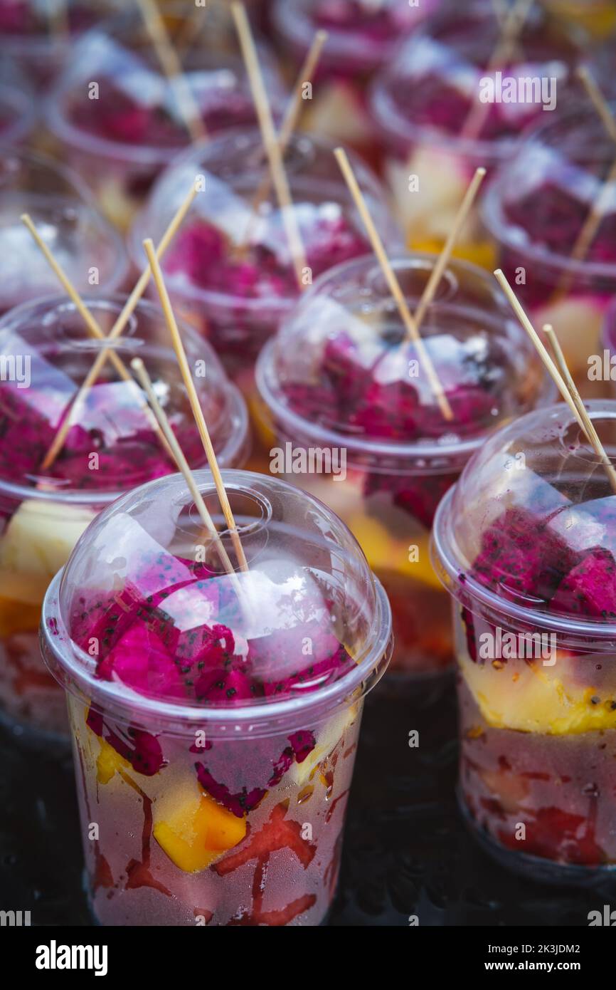 variety of fresh fruit cuts in a container Stock Photo - Alamy