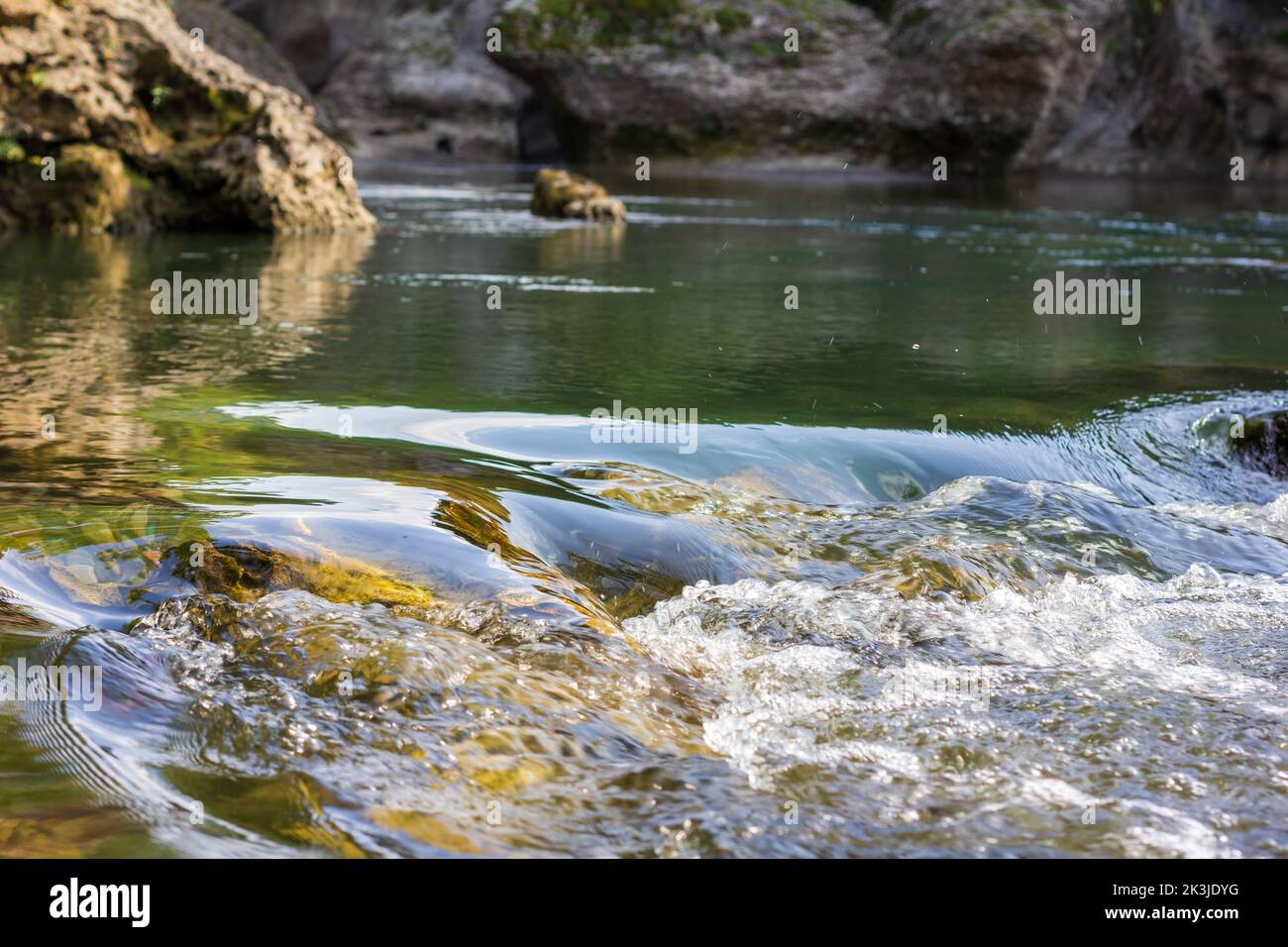 water flow of a mountain river close-up Stock Photo - Alamy