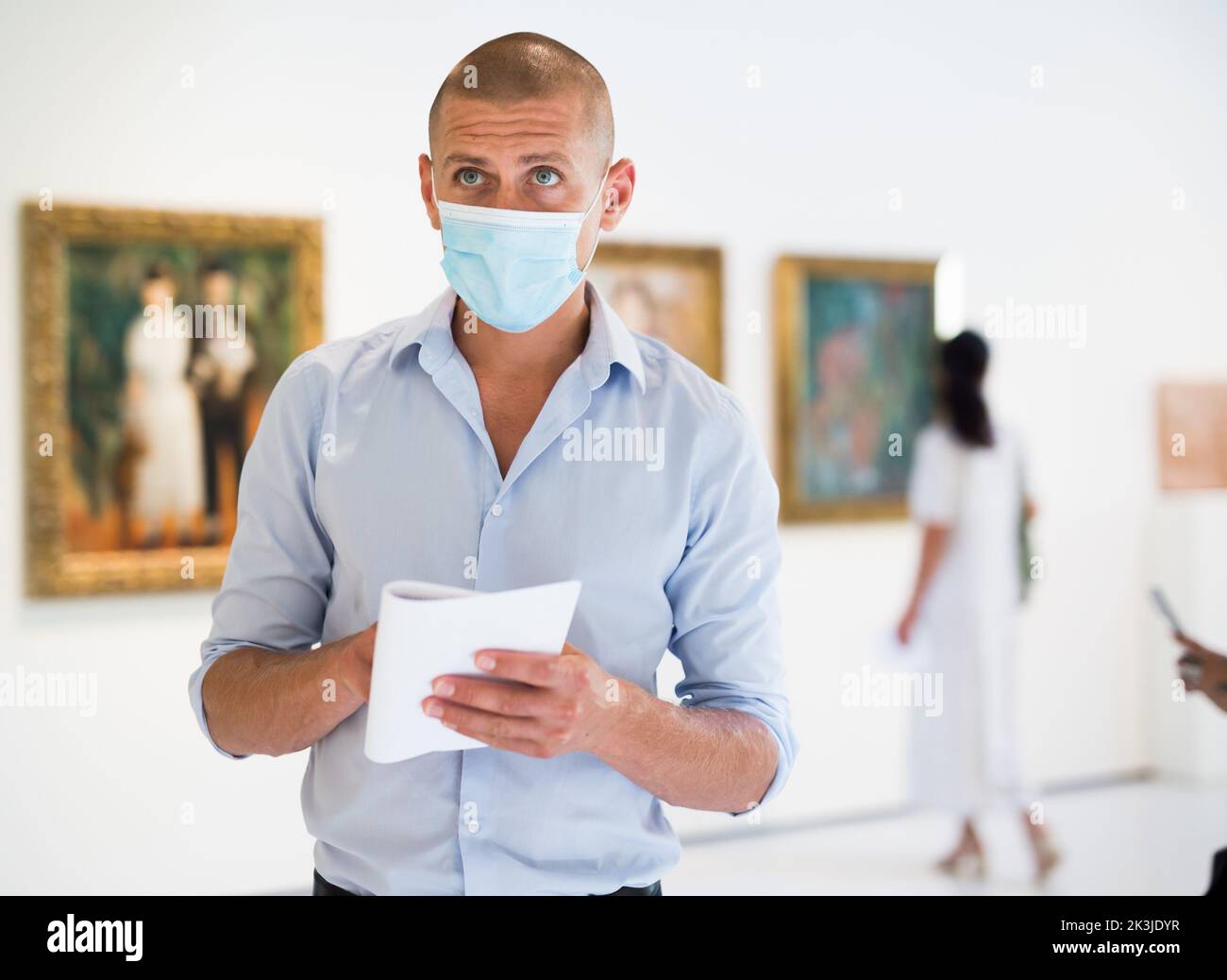 man with mask in museum Stock Photo - Alamy