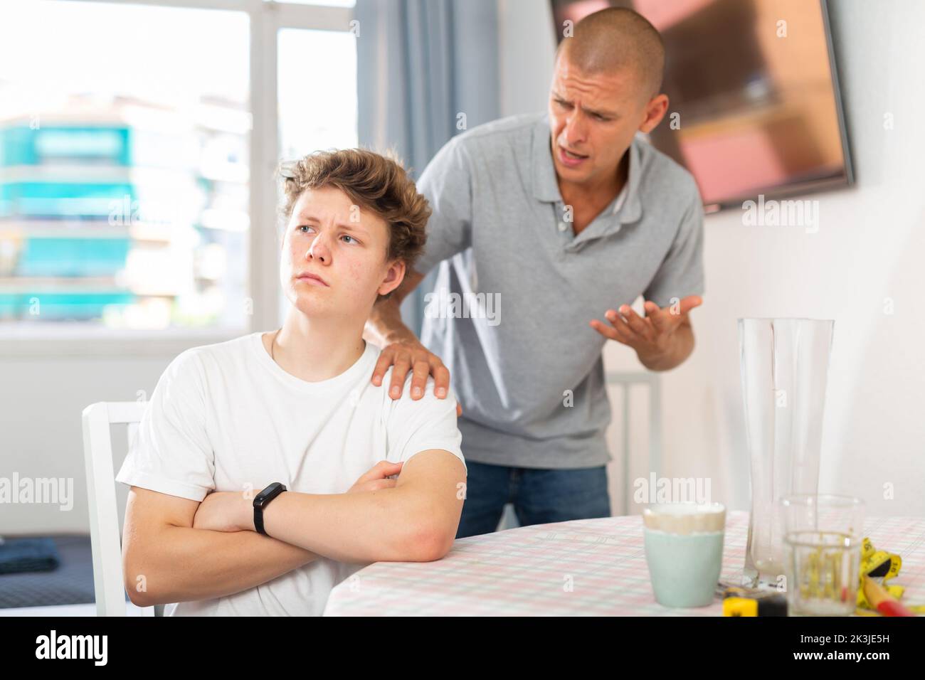 Dad shouting at his son Stock Photo - Alamy