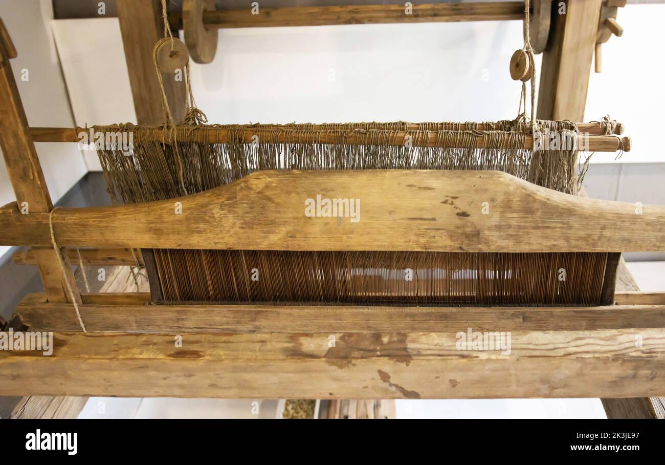 Old loom. Device for the manufacture of textile products, close-up ...