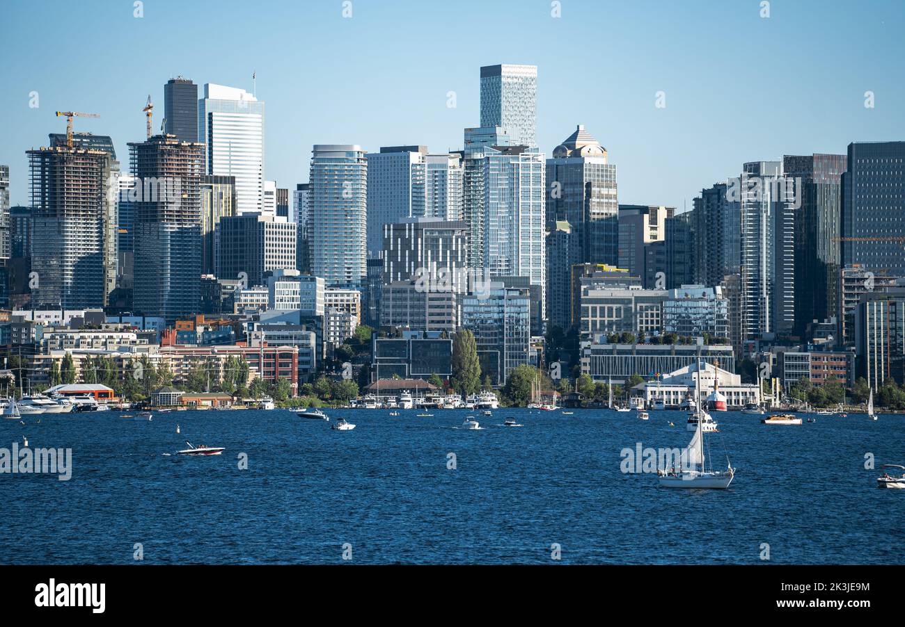 A vertical shot of boats on water waves in Seattle Washington with the ...