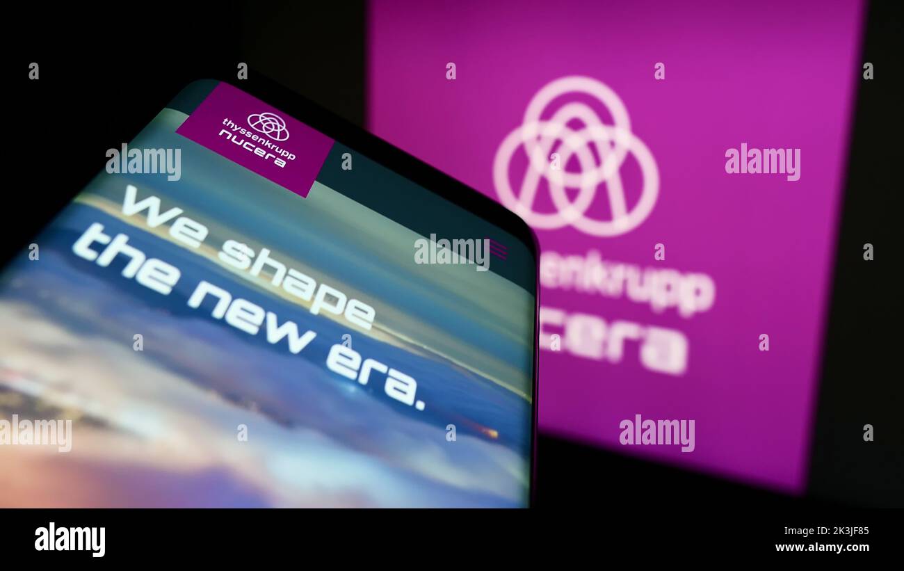 Mobile phone with website of company thyssenkrupp nucera AG Co. KGaA on ...