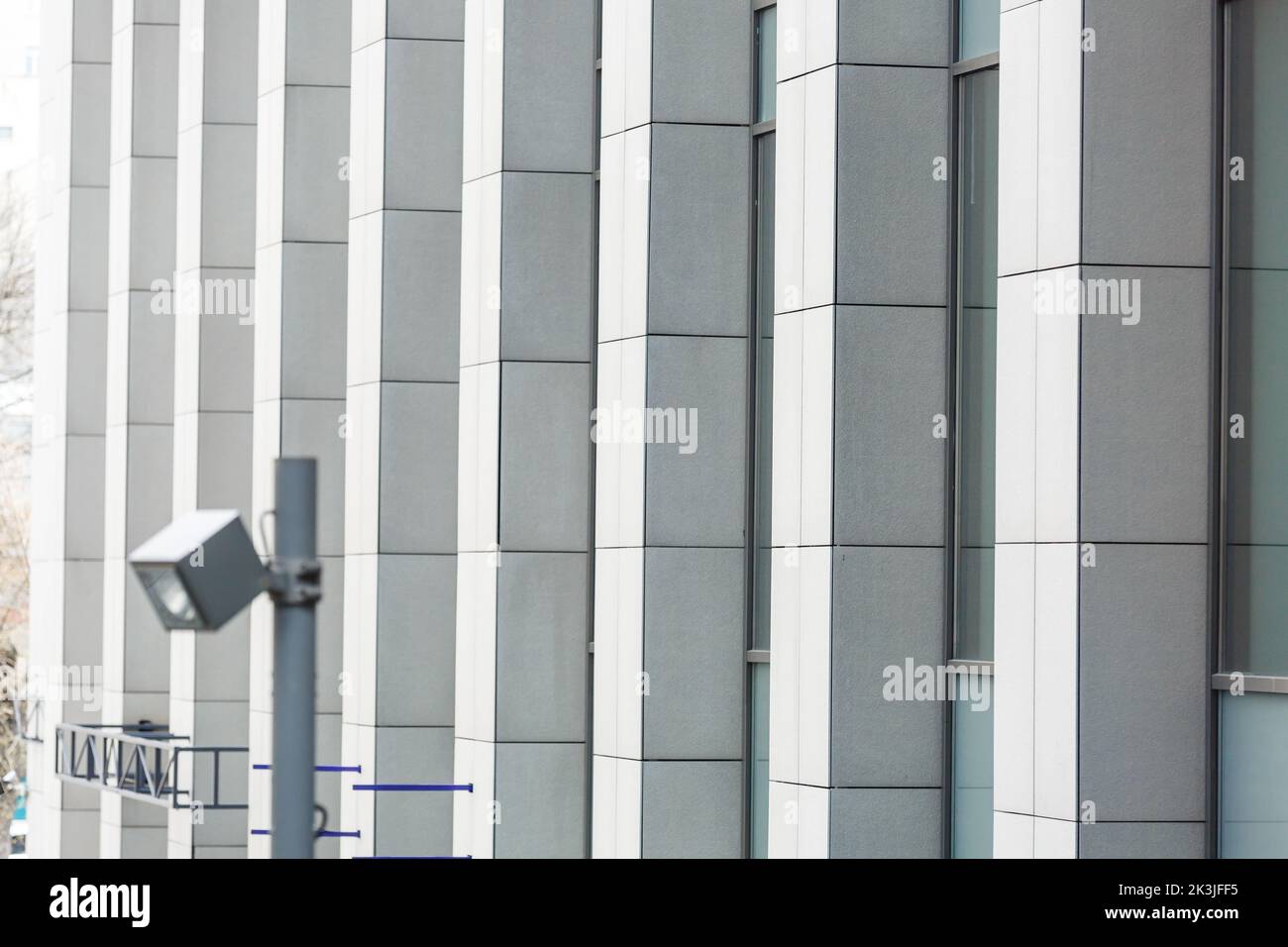 Grey concrete exterior of modern office building. Wall surface, blocks ...