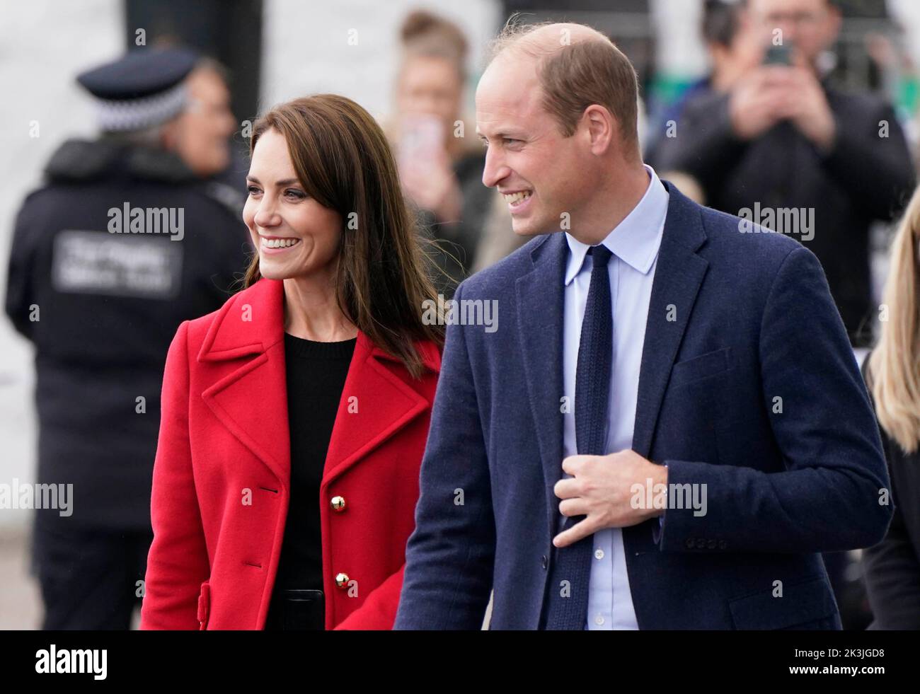 The Prince and Princess of Wales smile to members of the public during ...