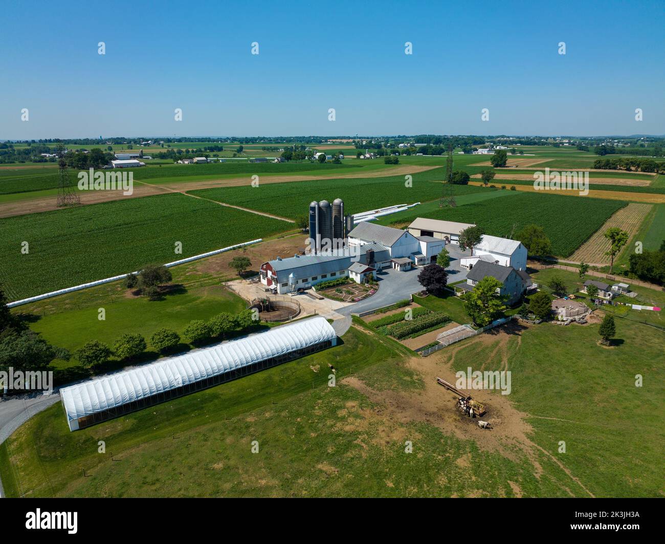 An aerial view of a countryside area with fields and houses Stock Photo ...