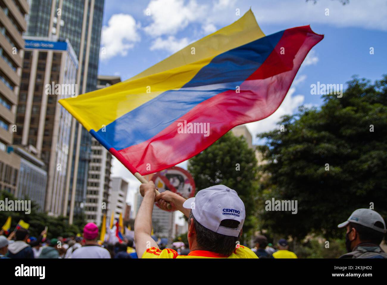 A demonstrator waves a Colombian flag during the first antigovernment ...
