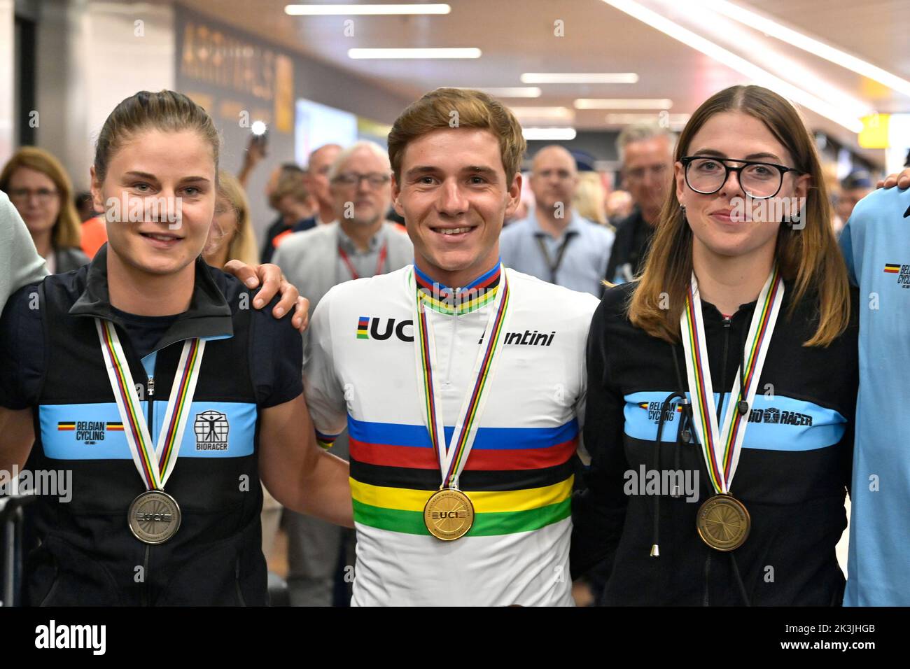 Belgian silver medal winner Lotte Kopecky, Belgian new world champion Remco Evenepoel and ...