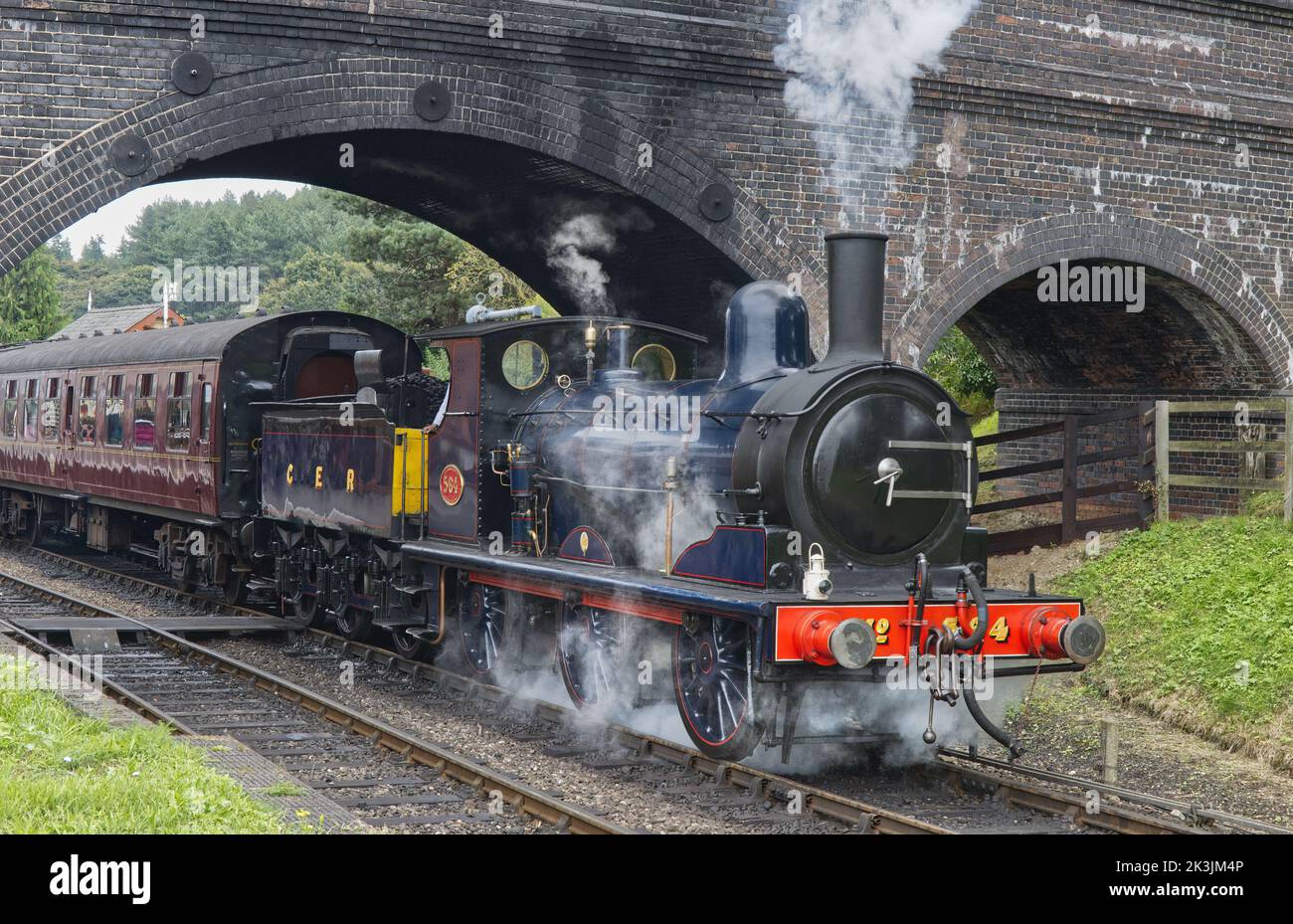 Steam locomotive GER Y14 0-6-0 – 564 pulling a train of BR Mk 1 coaches ...