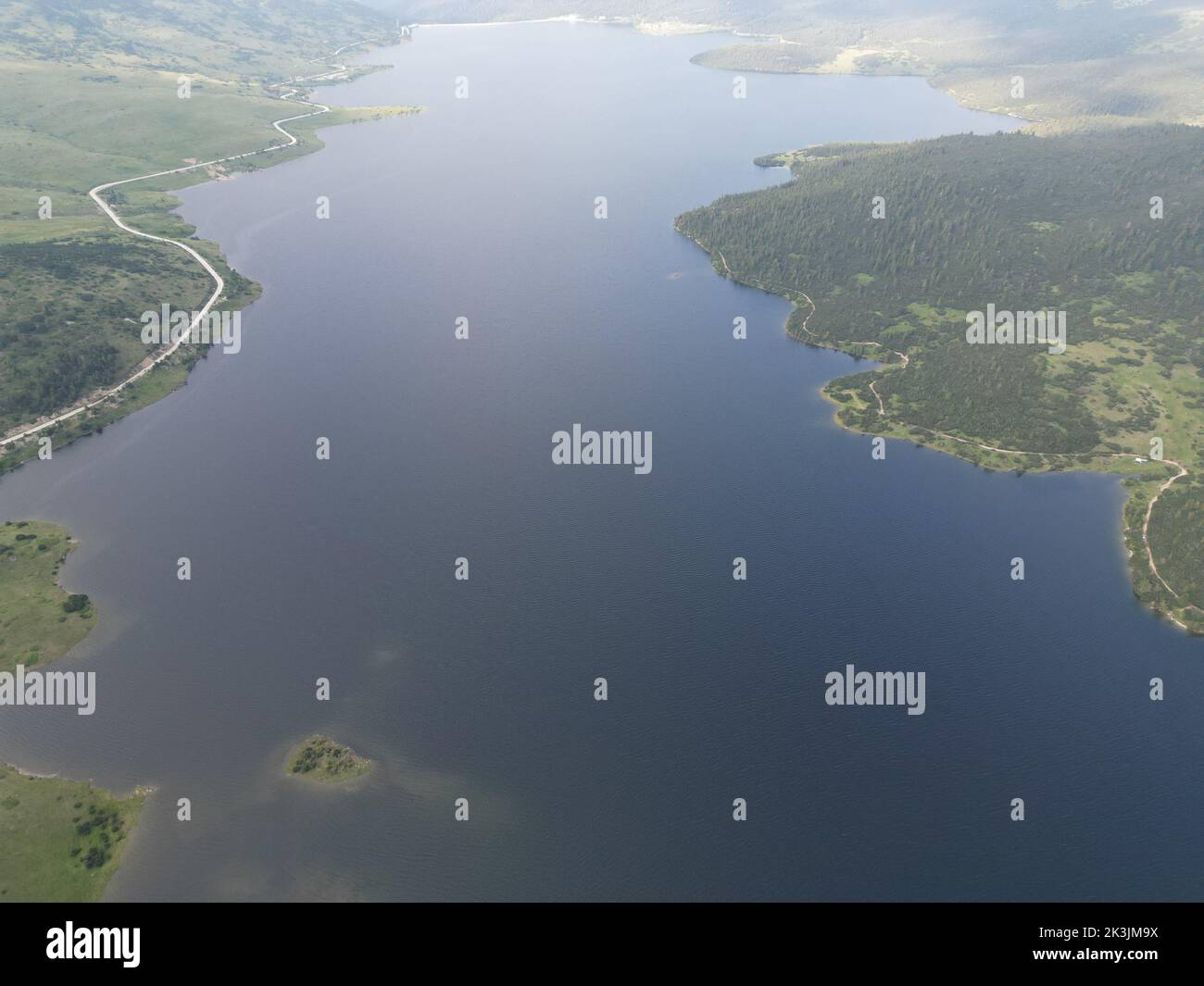 An aerial view of a river surrounded by a green landscapes Stock Photo ...