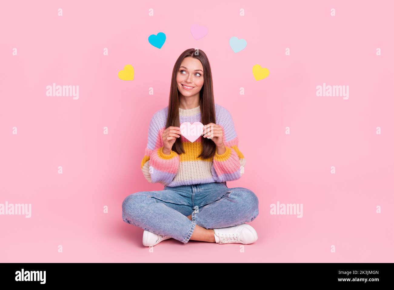 Full body portrait of lovely cheerful lady hols small heart look empty ...