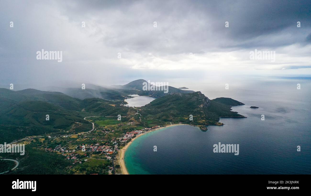 An aerial view of the coastal village and Toroni beach in Sithonia ...