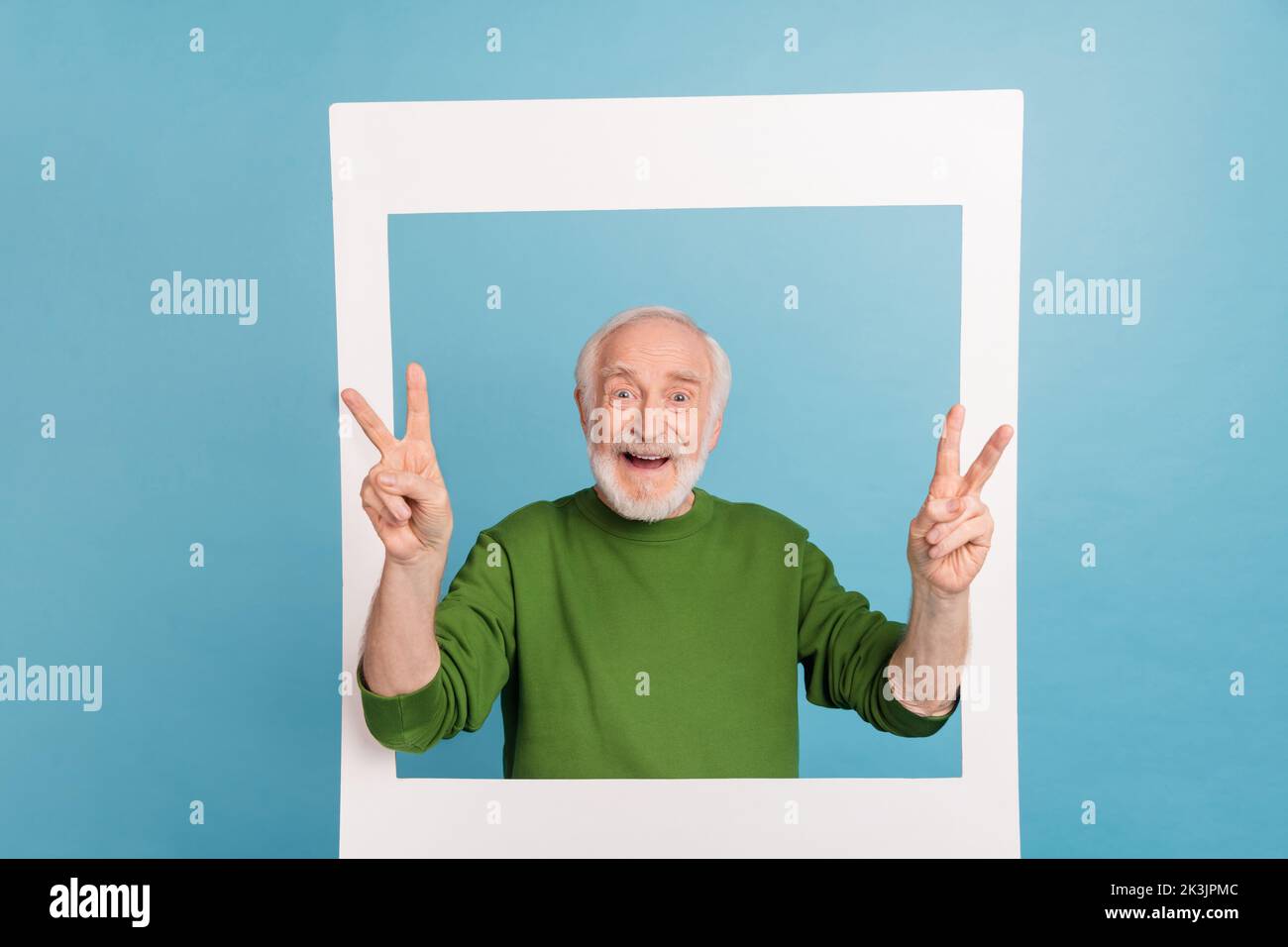 Portrait of crazy excited person two hands demonstrate v-sign hello ...
