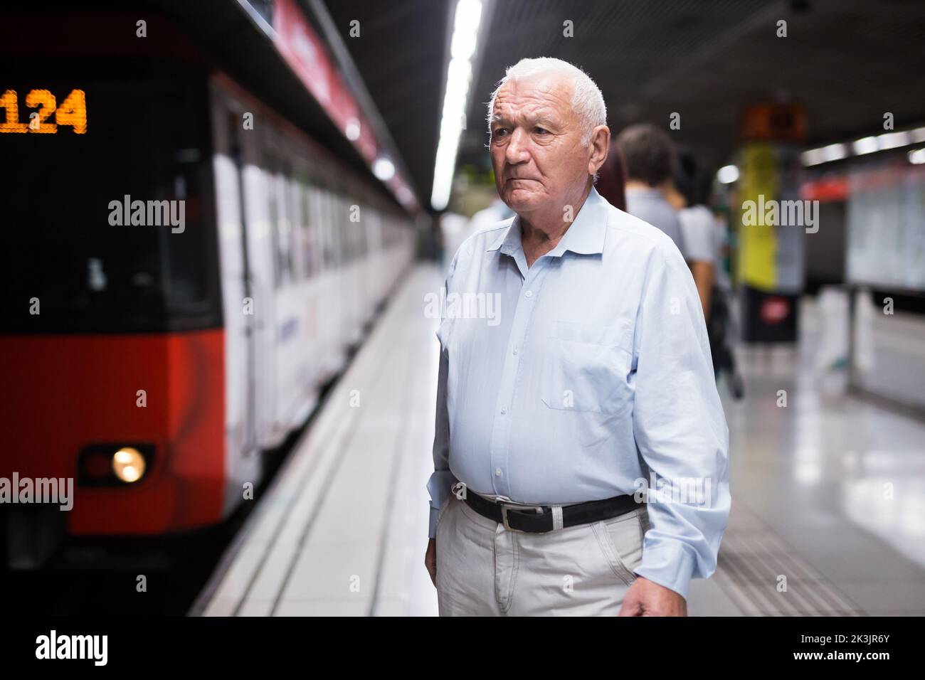 Old man in subway station Stock Photo - Alamy