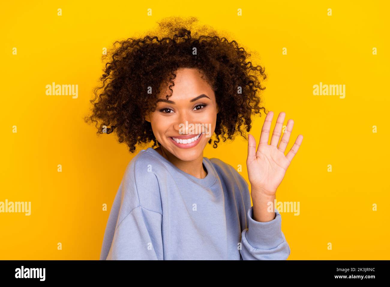 Portrait of cheerful lovely cute person toothy smile arm plan waving hi ...