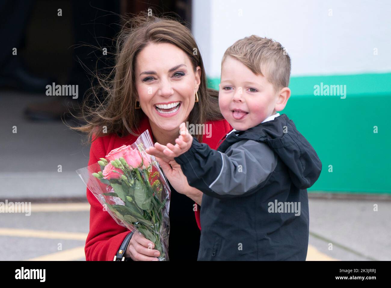 The Princess of Wales receives a posy of flowers from four-year-old ...