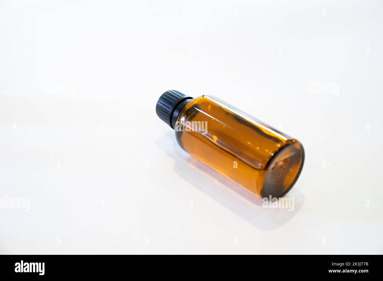 Various sizes of amber glass bottles Stock Photo - Alamy