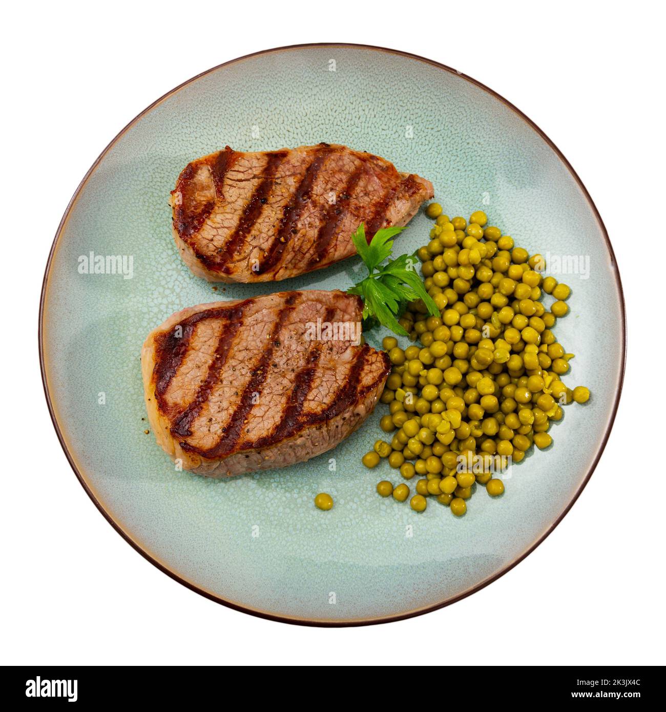 Roasted beef with green peas Stock Photo - Alamy