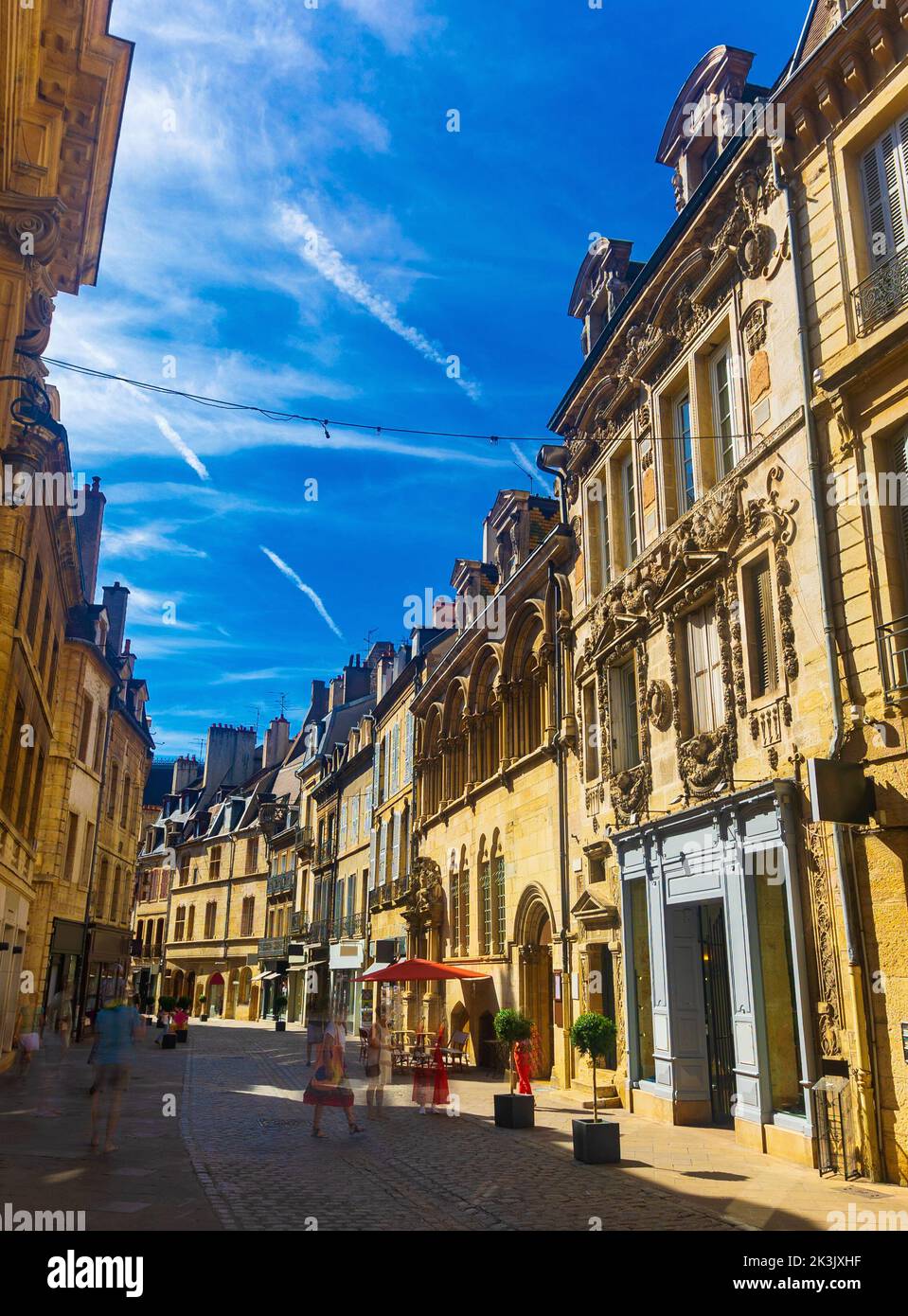 Summer cityscape of Dijon with narrow street and typical townhouses ...