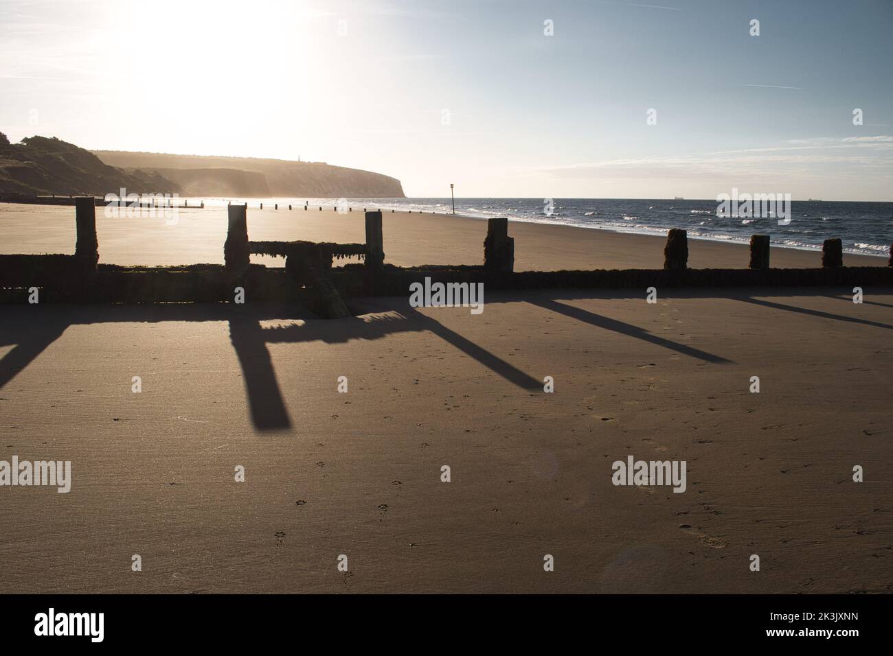 A beautiful view of the breakwater on Yaverland beach and sea in Isle ...