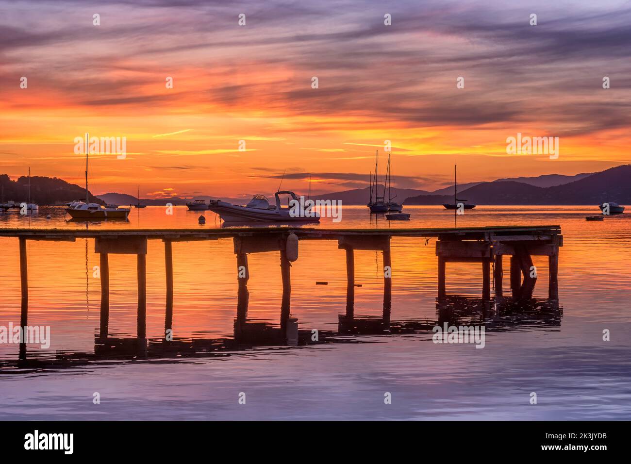 Scenic view of bay with dock and boats on the french riviera in summer ...