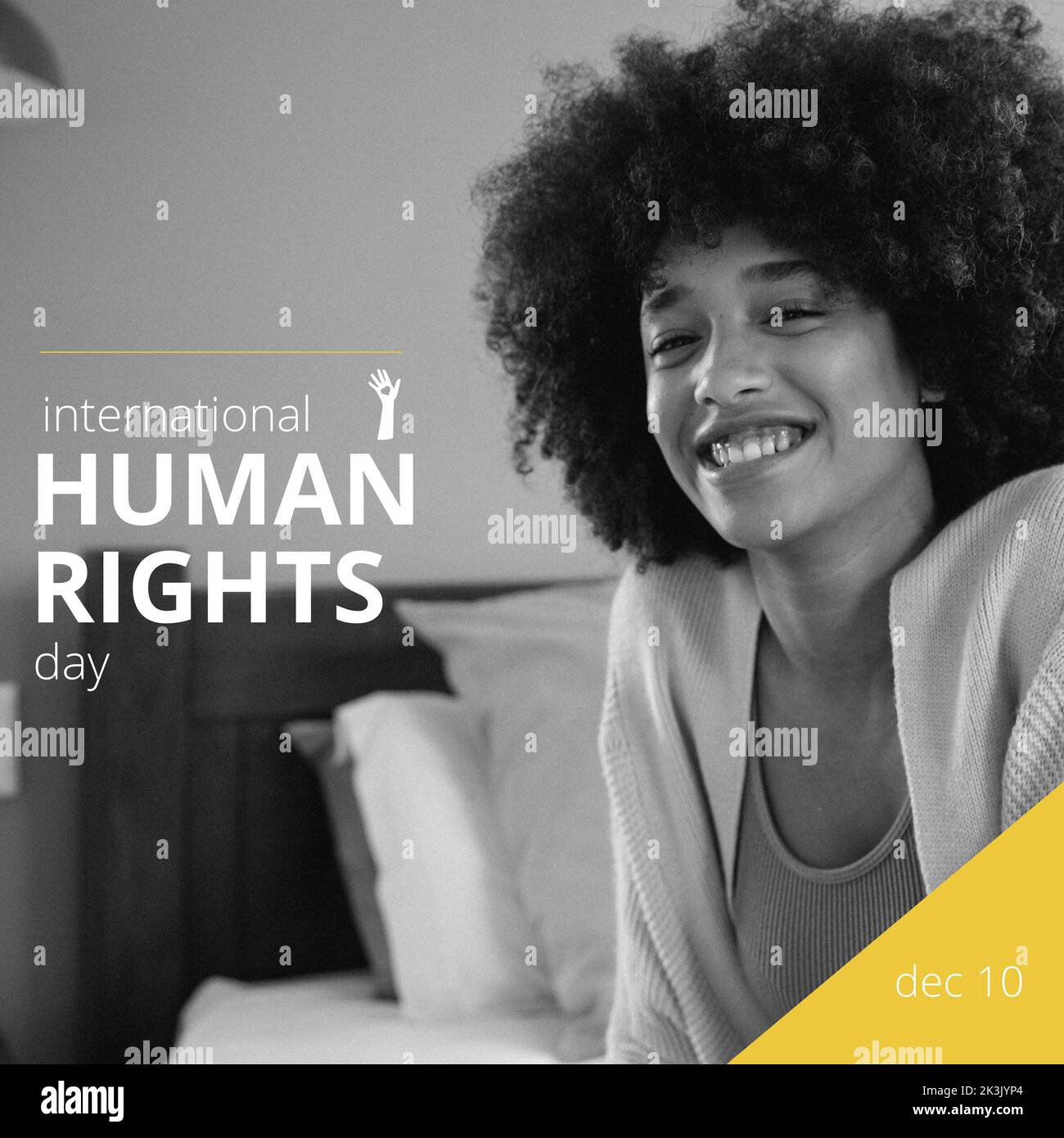 Portrait of smiling biracial young woman with afro hair and ...