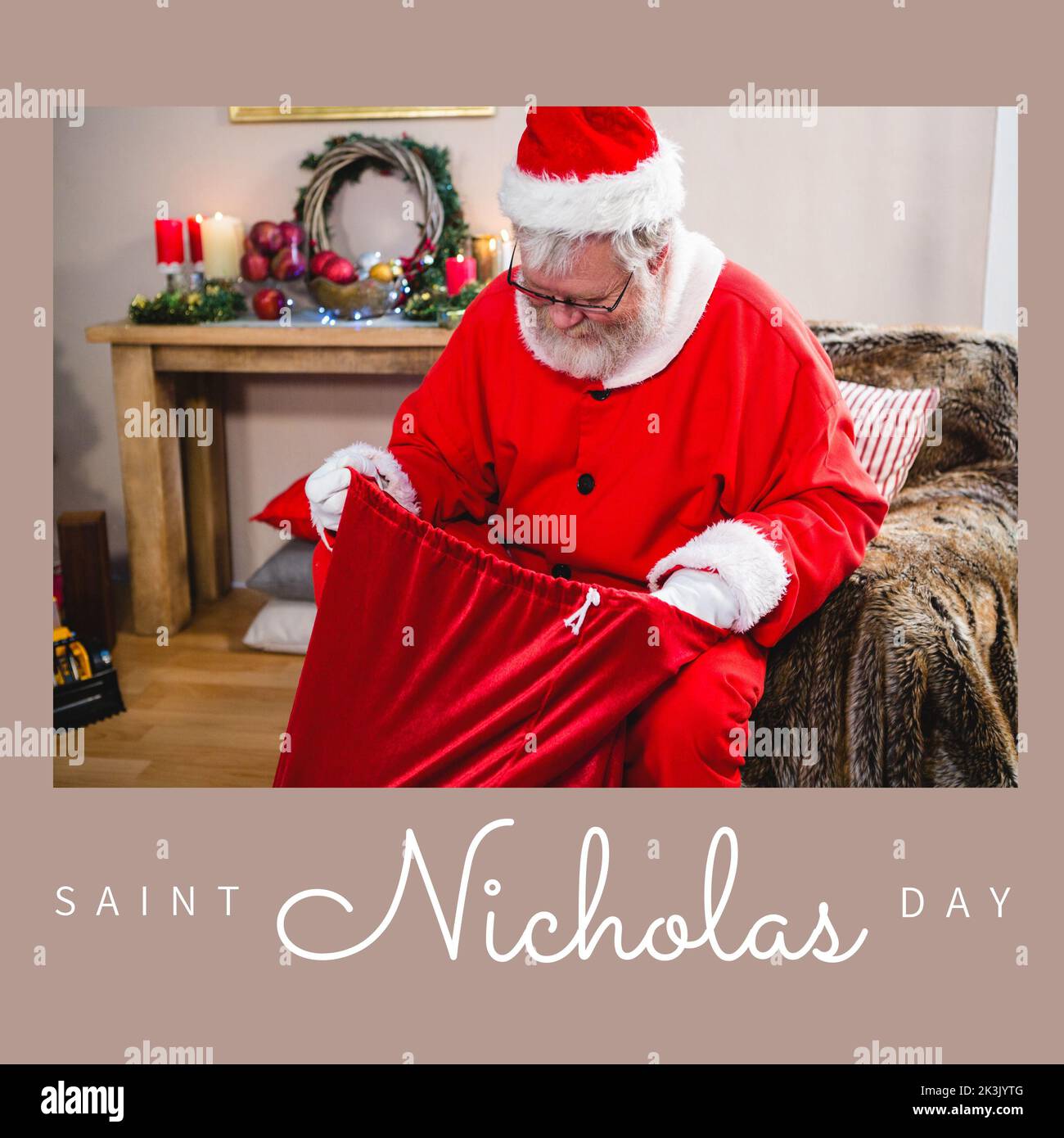 Composition of saint nicholas day text over santa claus holding red ...