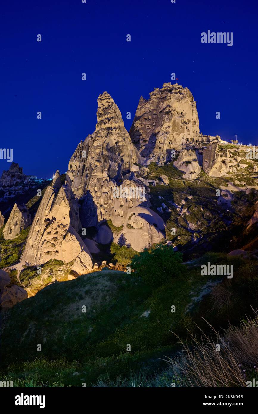 uchisar castle, Twilight photo of the perforated castle rock of Uçhisar ...
