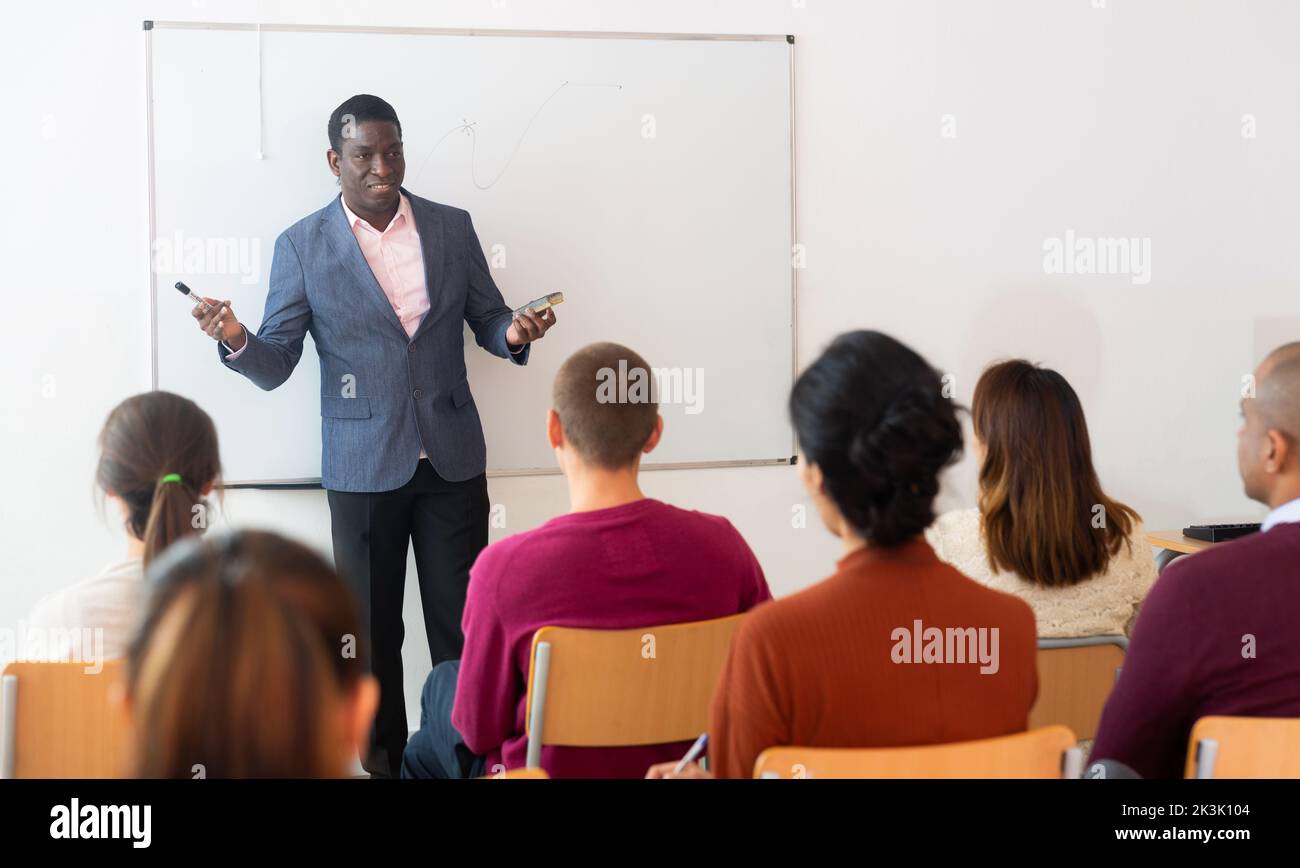 University teacher conducts lesson for students Stock Photo - Alamy