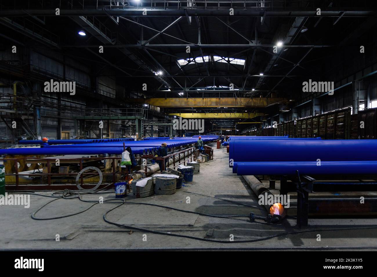 New cast iron pipes for pipeline construction in the factory Stock ...