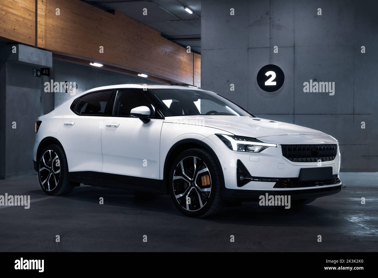 a Snow white Polestar 2 tailgate in a garage Stock Photo - Alamy