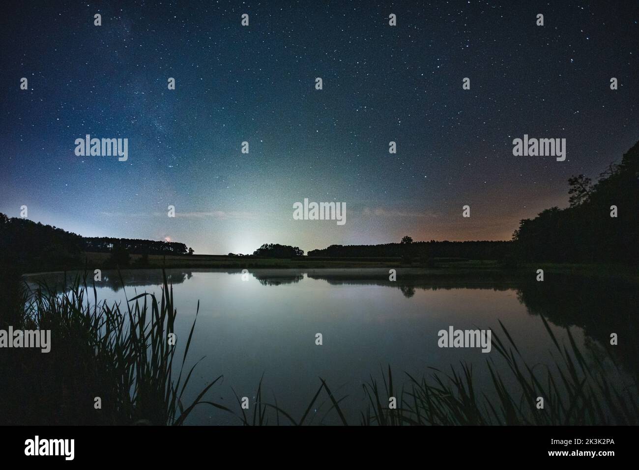 a stunning nighttime landscape of a starry sky Stock Photo - Alamy