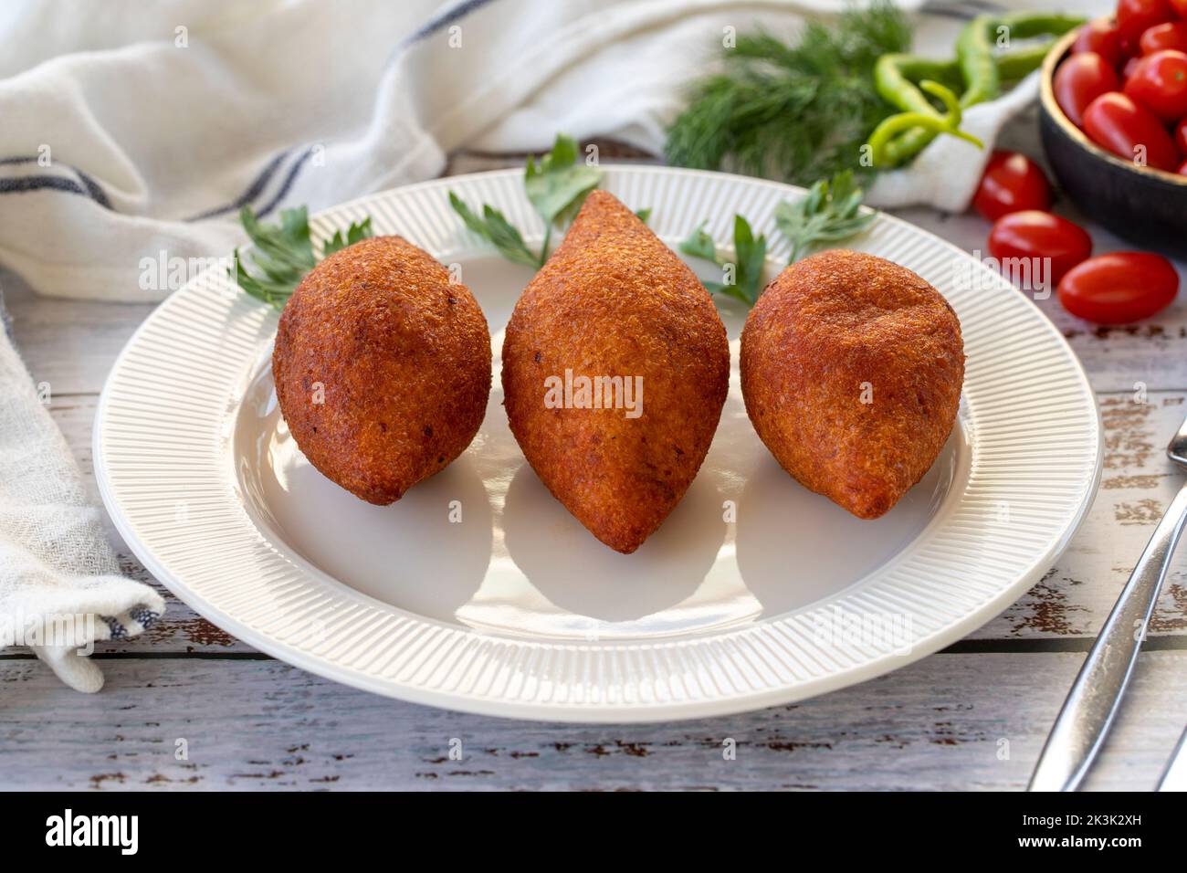 Stuffed meatballs. Turkish cuisine delicacies. Kibbeh or icli kofte on ...