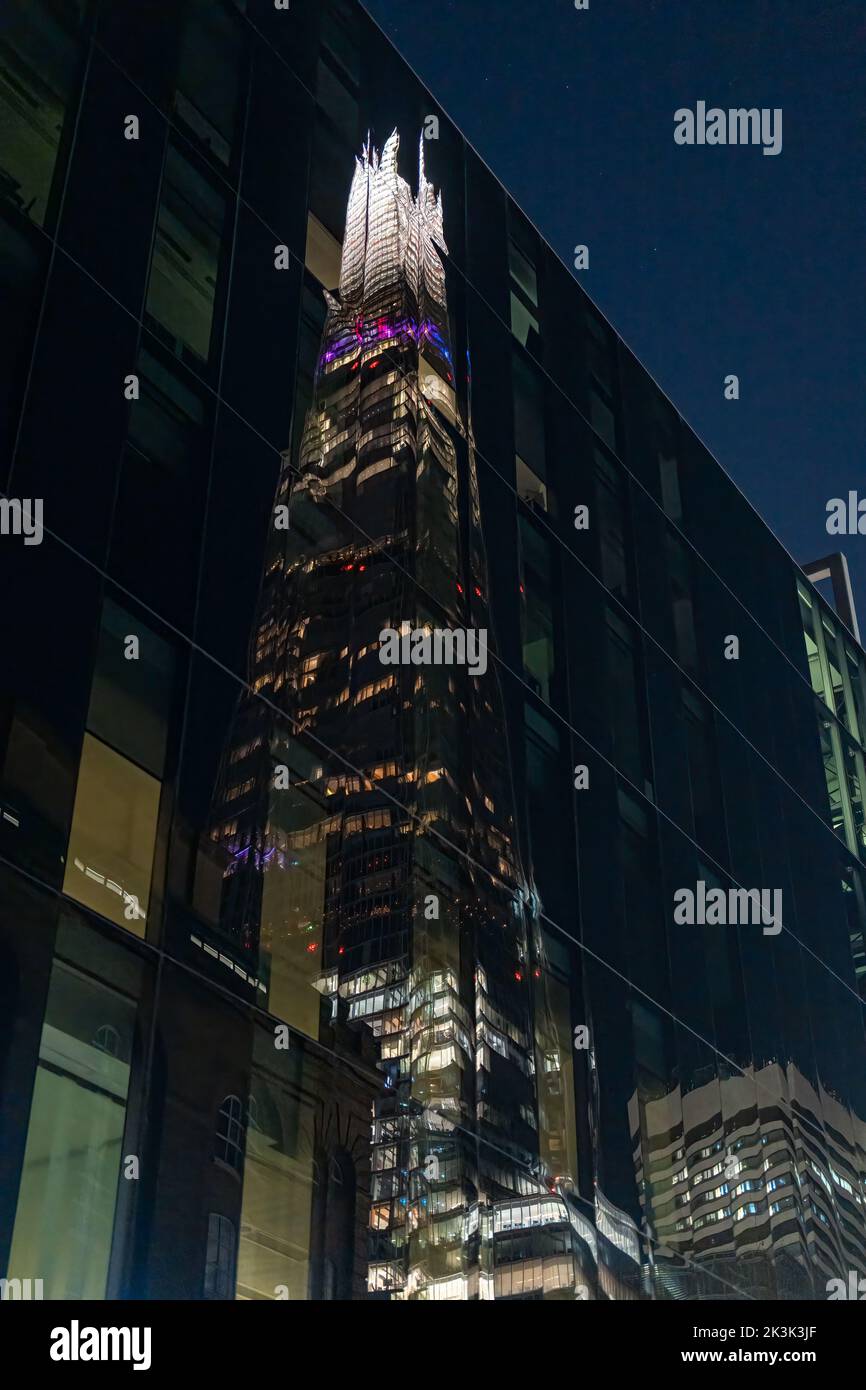 A vertical shot of a reflection of the shard in a glass front Stock ...