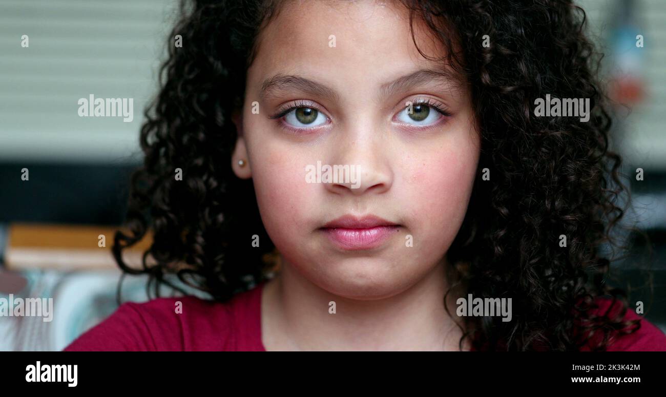 Hispanic little girl, mixed race child portrait Stock Photo - Alamy