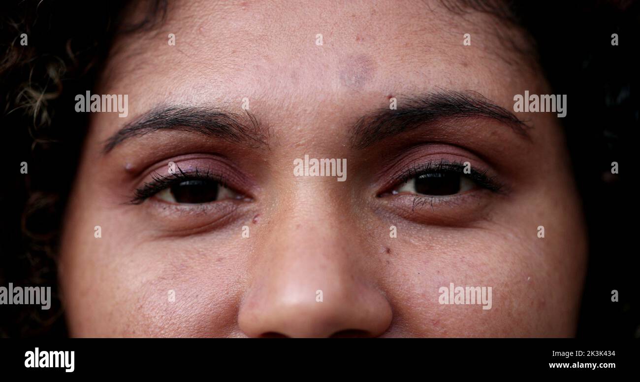 Hispanic woman eyes macro close-up. Latina opening and closing eye ...