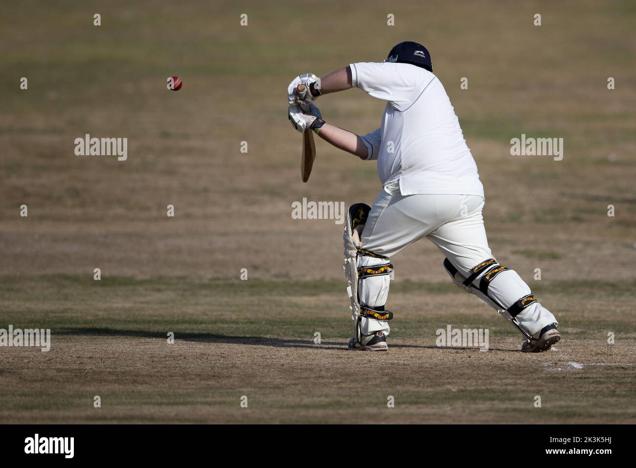 Cricket bowling & batting mens game Stock Photo - Alamy