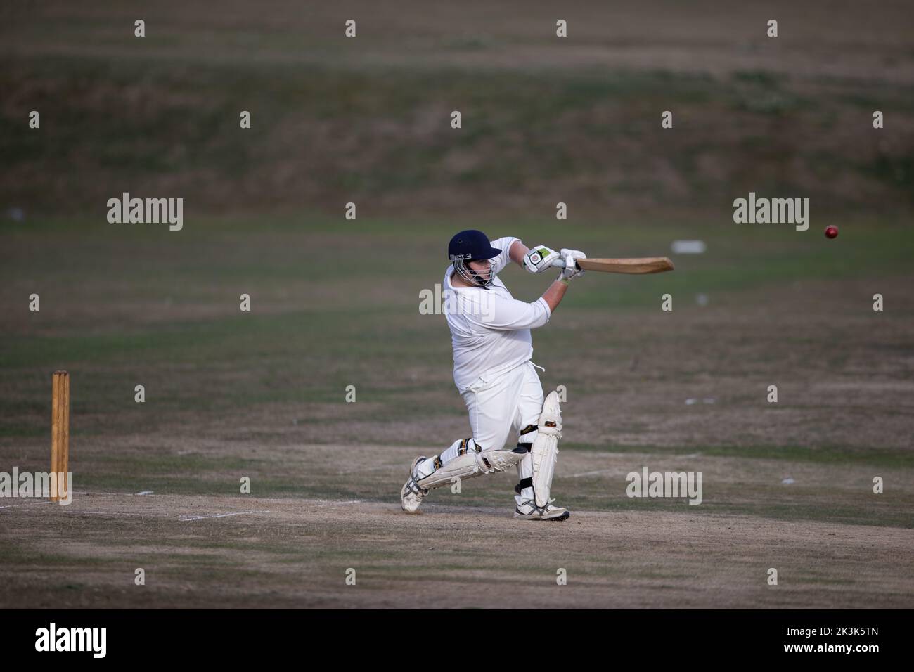 Cricket bowling & batting mens game Stock Photo - Alamy