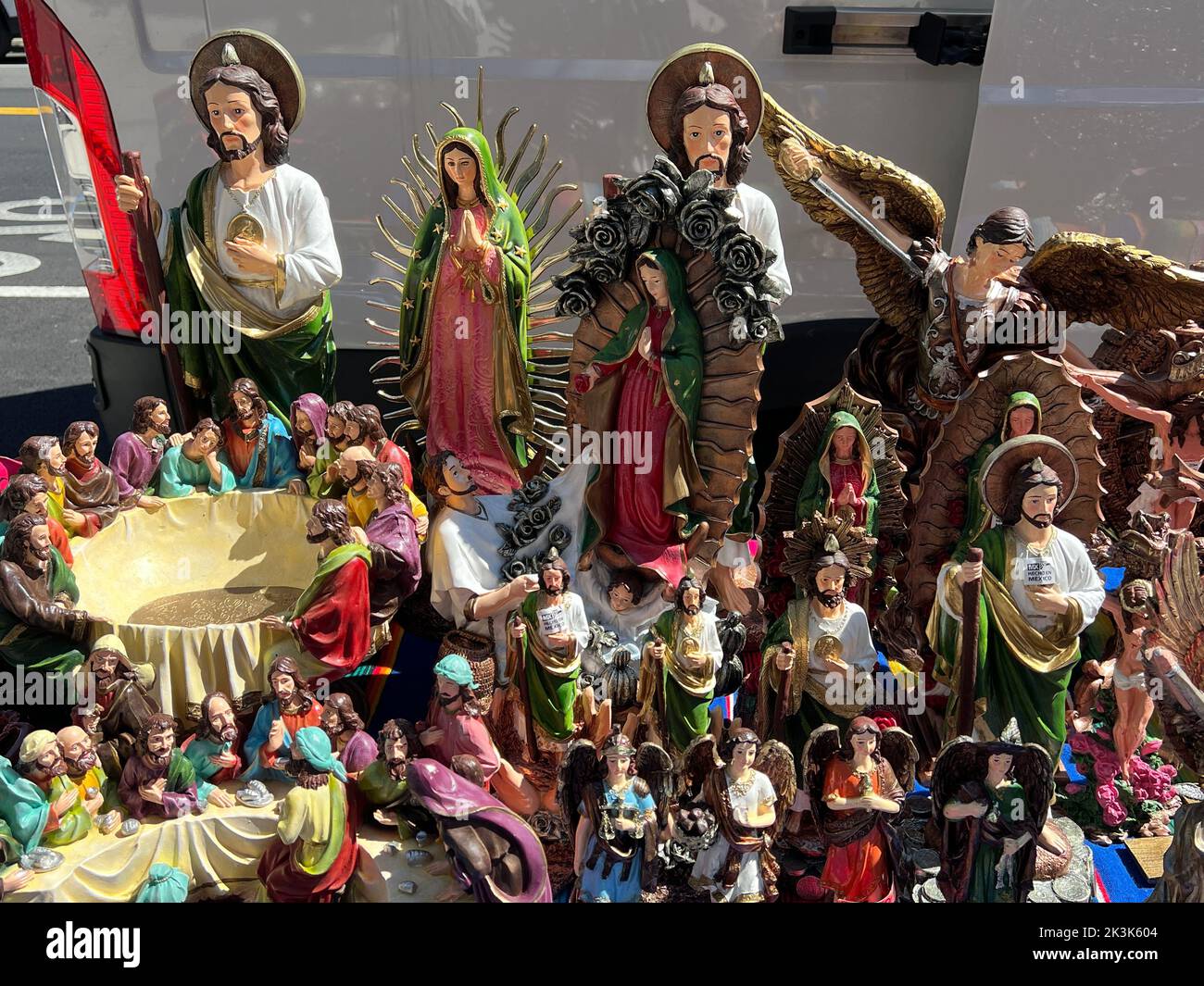 Religious and other statuary made in Mexico for sale on the street on ...