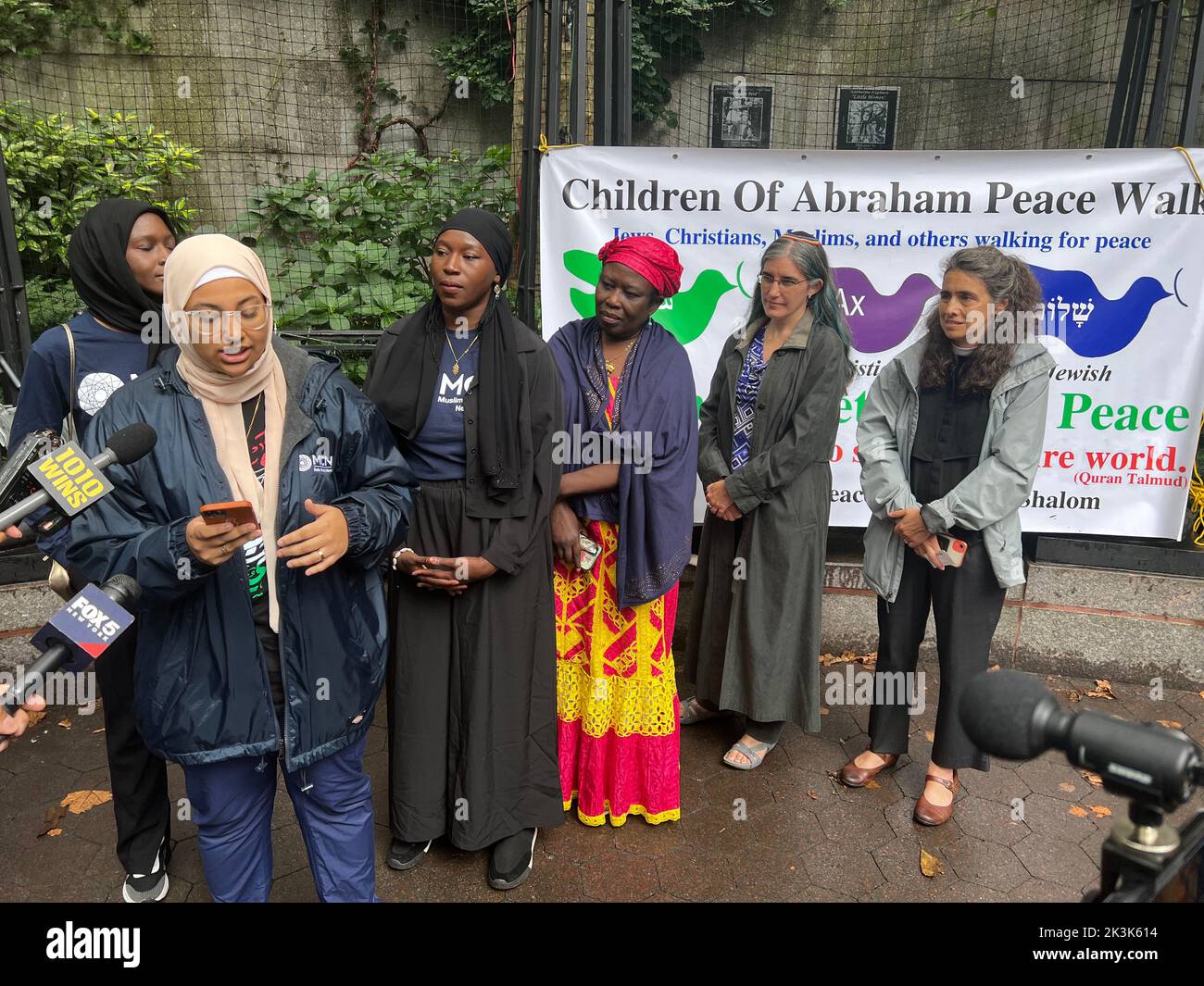 Members of various religious groups and religions come together by the ...