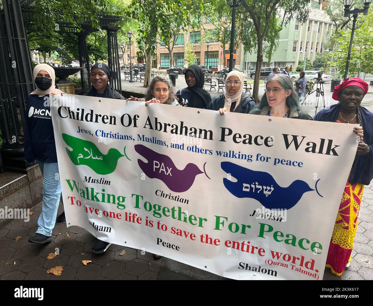 Members of various religious groups and religions come together by the ...