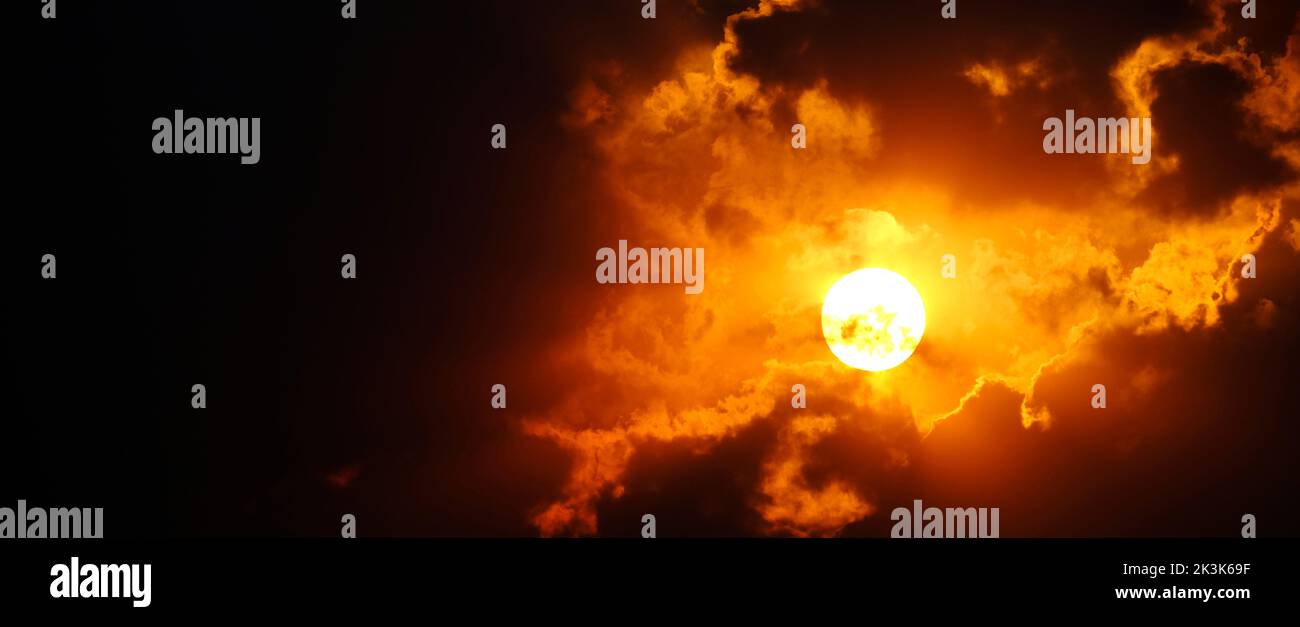 Sunlight sun rays shining through clouds in sky symbolizing hope and ...