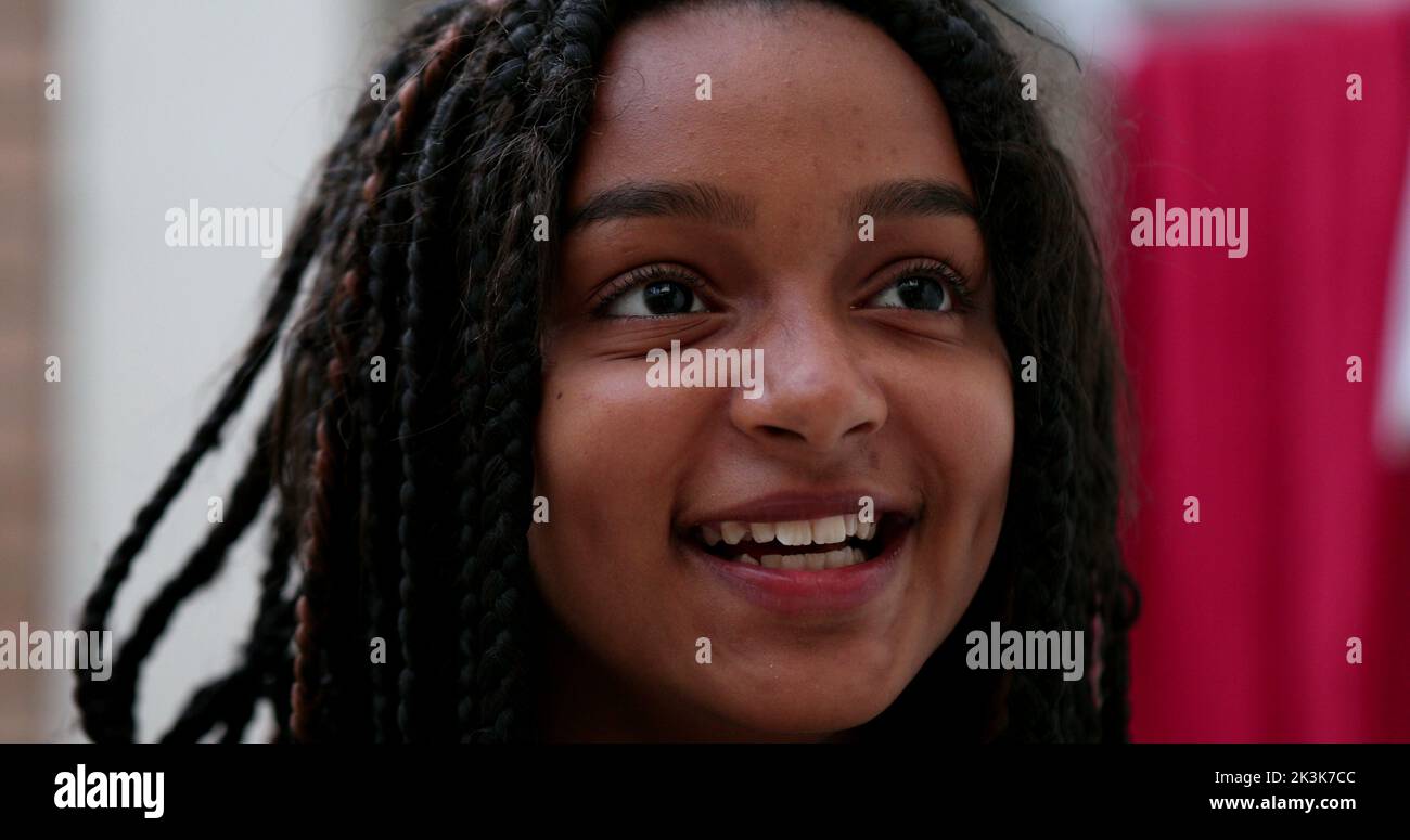 Happy Brazilian preteen girl smiling. Black African descent child ...
