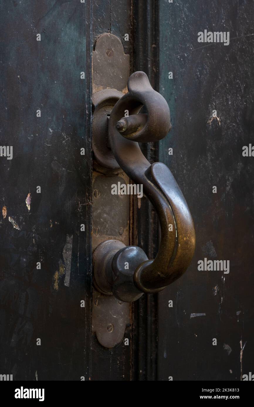 Closeup view of vintage brass door handle with beautiful patina ...