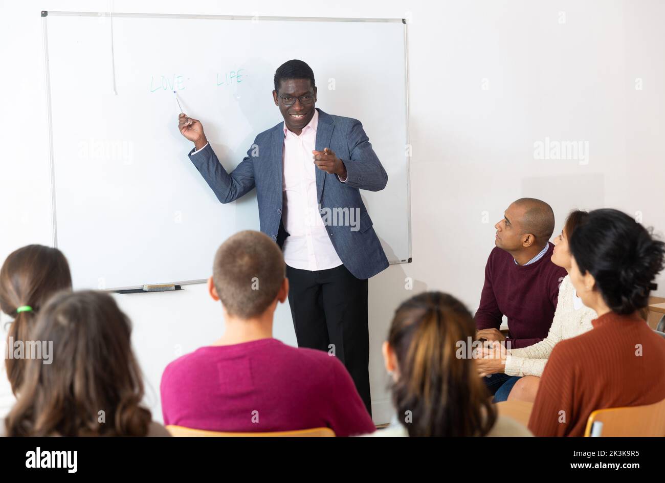 University teacher conducts lesson for students Stock Photo - Alamy
