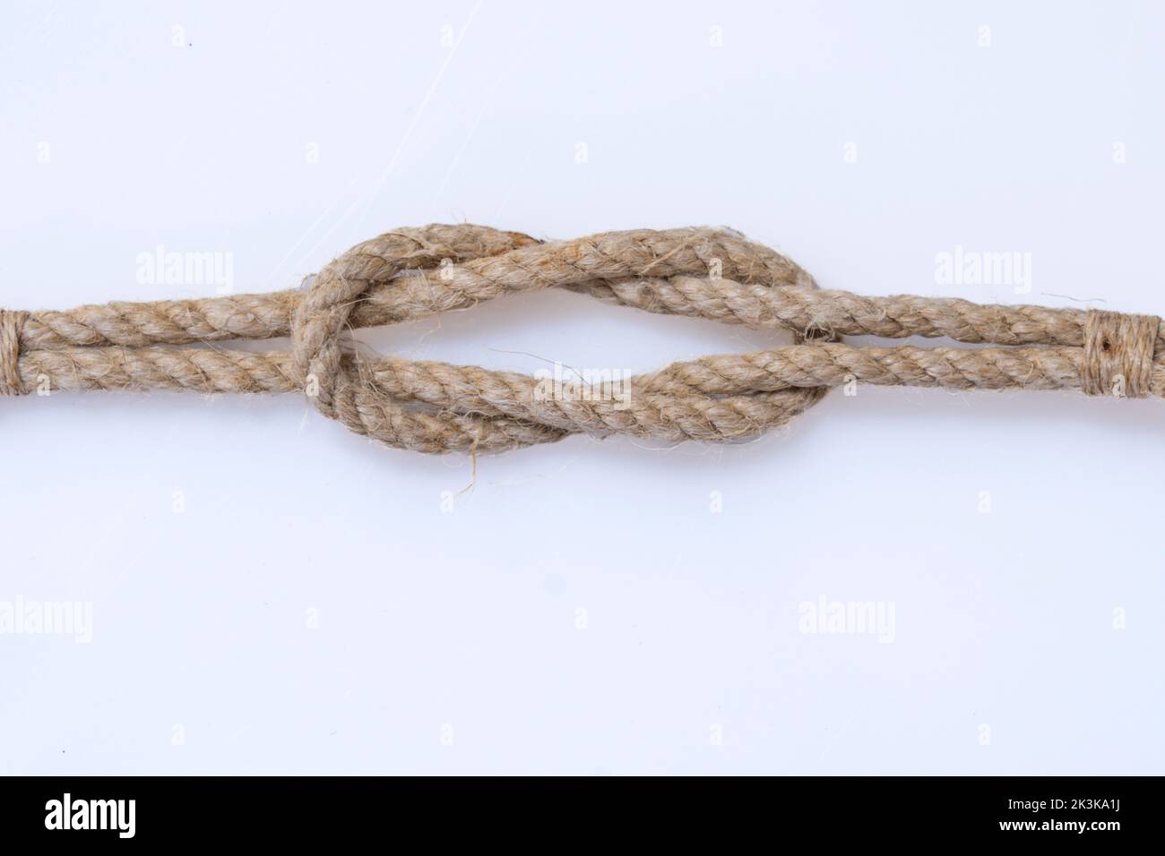 rope forming a square knot ,Balearic islands, Spain Stock Photo - Alamy