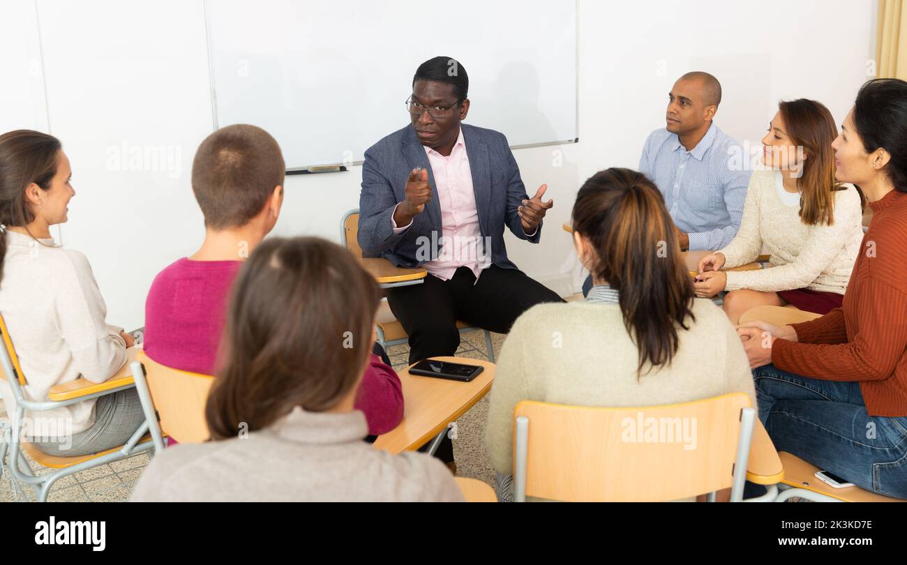 University teacher conducts lesson for students Stock Photo - Alamy